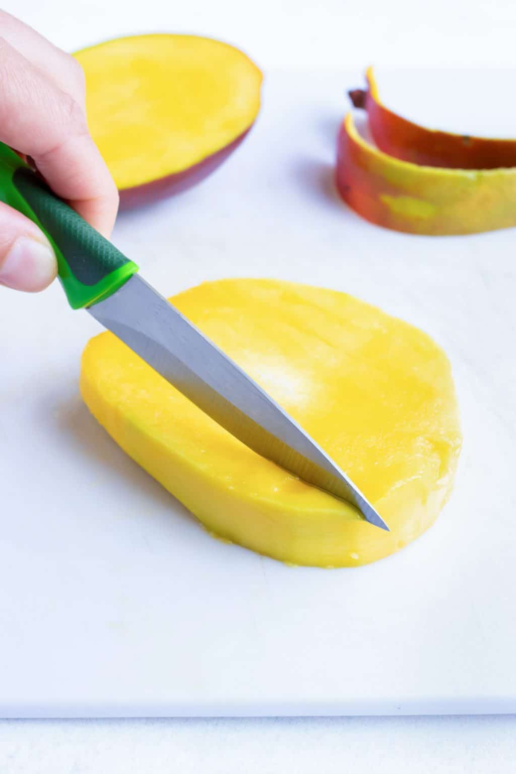 How to Cut a Mango (with Video) - Evolving Table