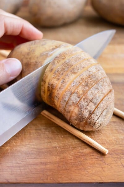 Cheesy Hasselback Potato Recipe - Evolving Table