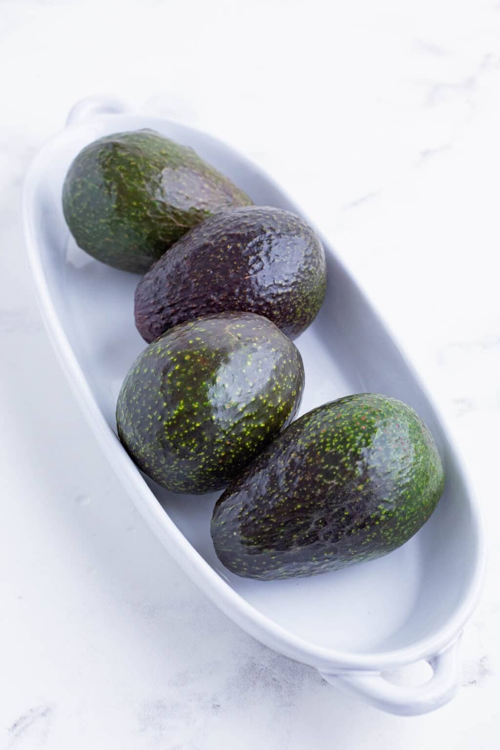 How to Ripen Avocados (5 Quick Ways!) - Evolving Table