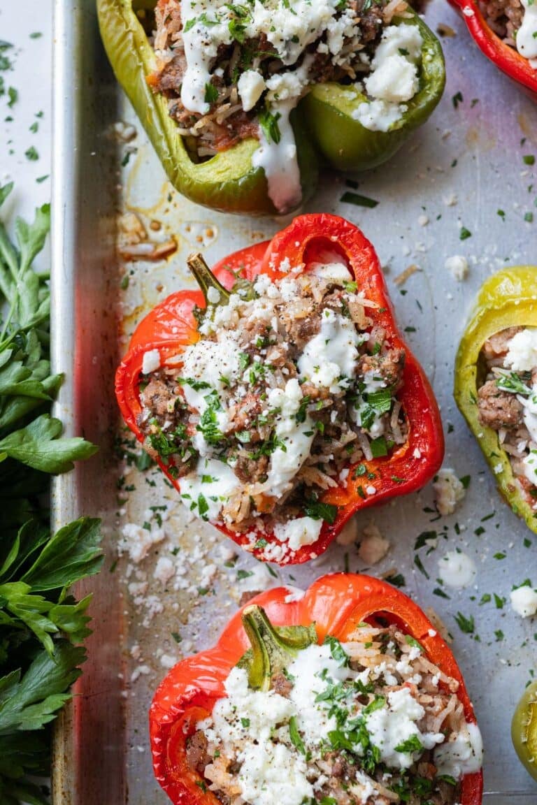 Easy Greek Stuffed Peppers with Beef, Rice & Feta - Evolving Table