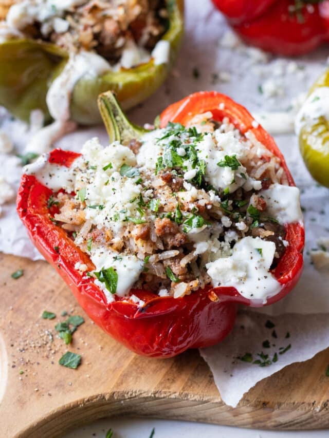 Easy Greek Stuffed Peppers with Beef, Rice & Feta - Evolving Table